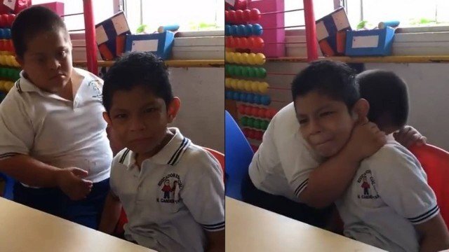 Menino com síndrome de Down acolhe colega com autismo e vídeo viraliza - Catraca Livre